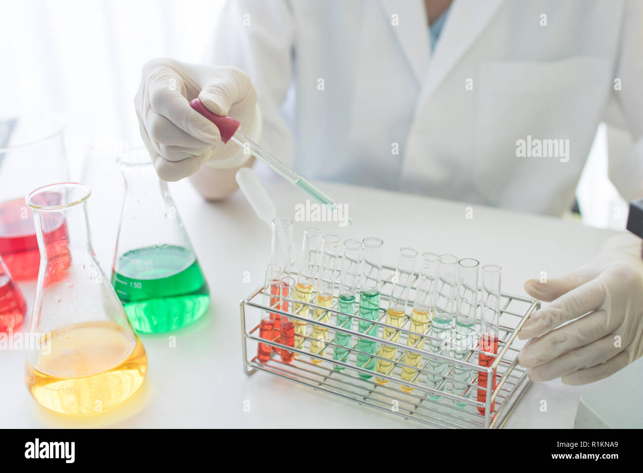 Scientist holding test tube hi-res stock photography and images - Alamy
