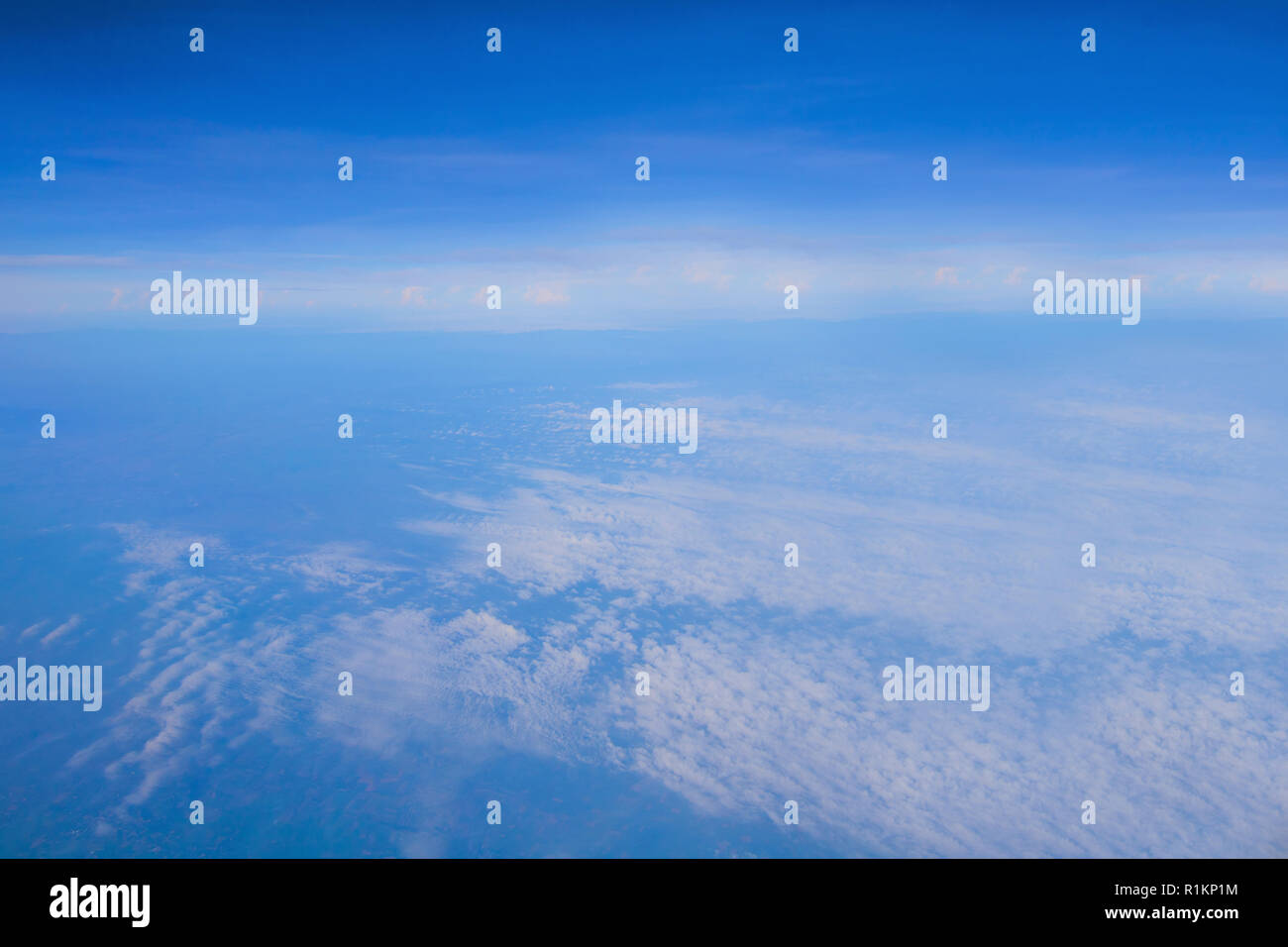blue sky and white clouds with land from top view on air plain Stock ...