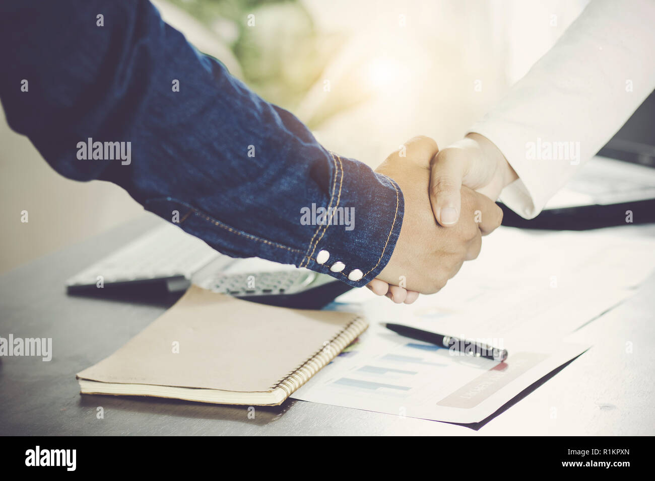 negotiations and business success concept, businessmen shaking hands or ...