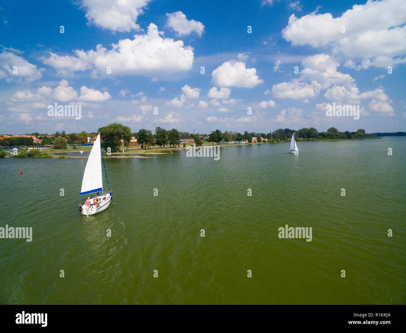 Aerial view of yacht sailing on Niegocin Lake, Gizycko town in the ...