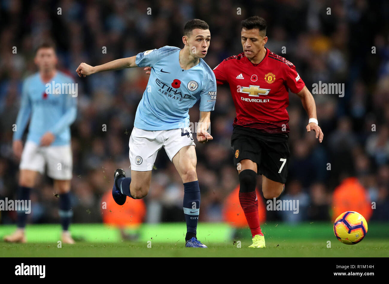 Manchester City's Phil Foden (left) and Manchester United's Alexis ...