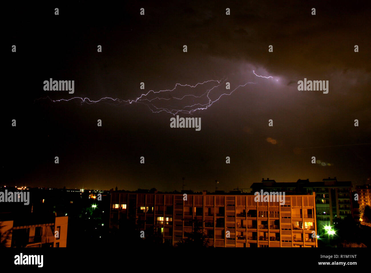 Lightning during a thunderstorm Stock Photo - Alamy