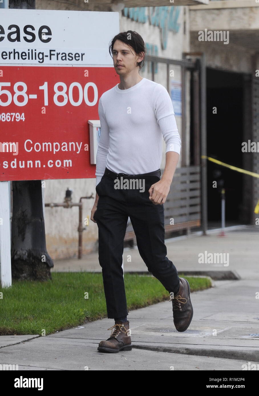 Austin Butler braves the rain and heads to a business meeting in Studio ...