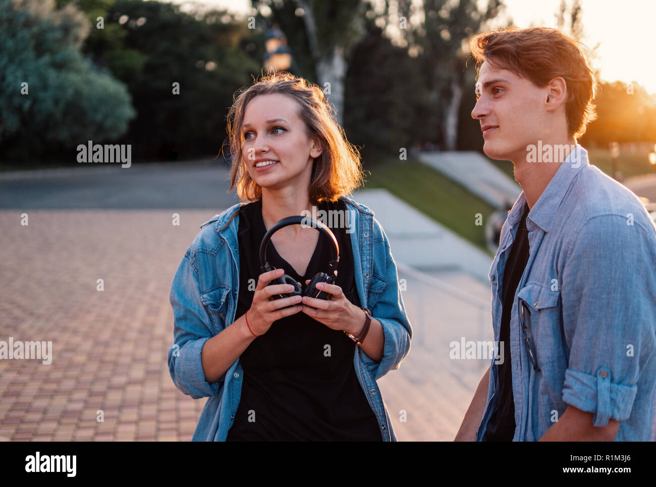 Couple look at sunset hi-res stock photography and images - Alamy