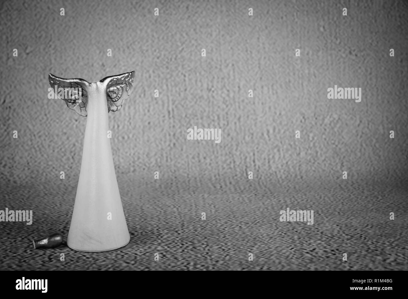 sad statue of angel withous head Stock Photo - Alamy
