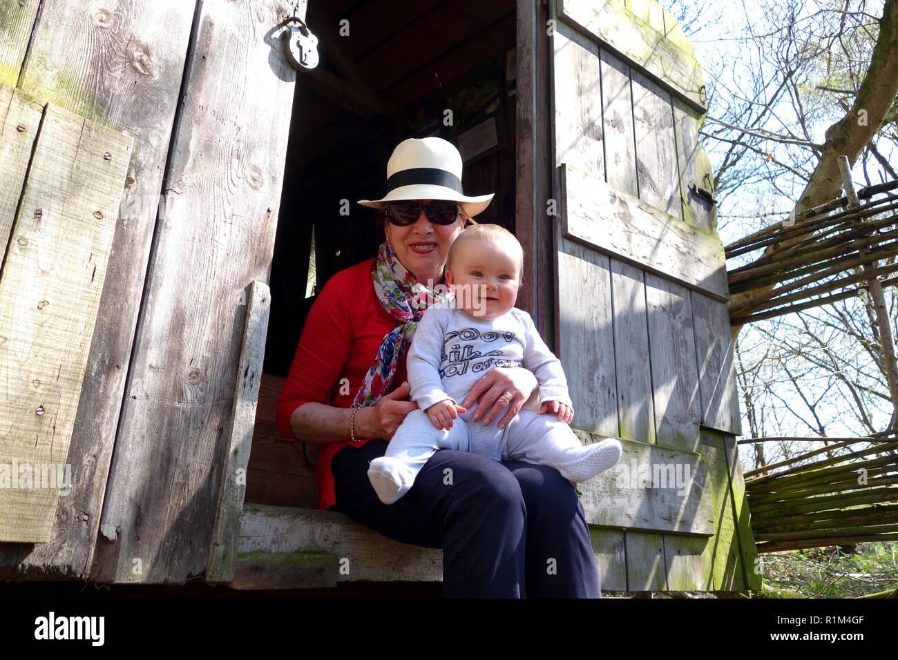Woman and baby in rural countryside setting England Uk Stock Photo - Alamy