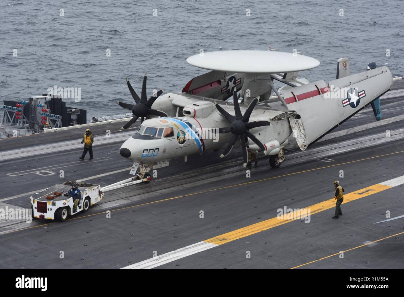 NORTH SEA (Oct. 16, 2018) Sailors transport an E-2D Hawkeye, assigned ...