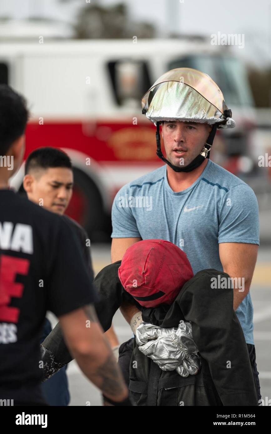 A participant drags a dummy during the 2018 Fire Muster Oct. 11, 2018 ...