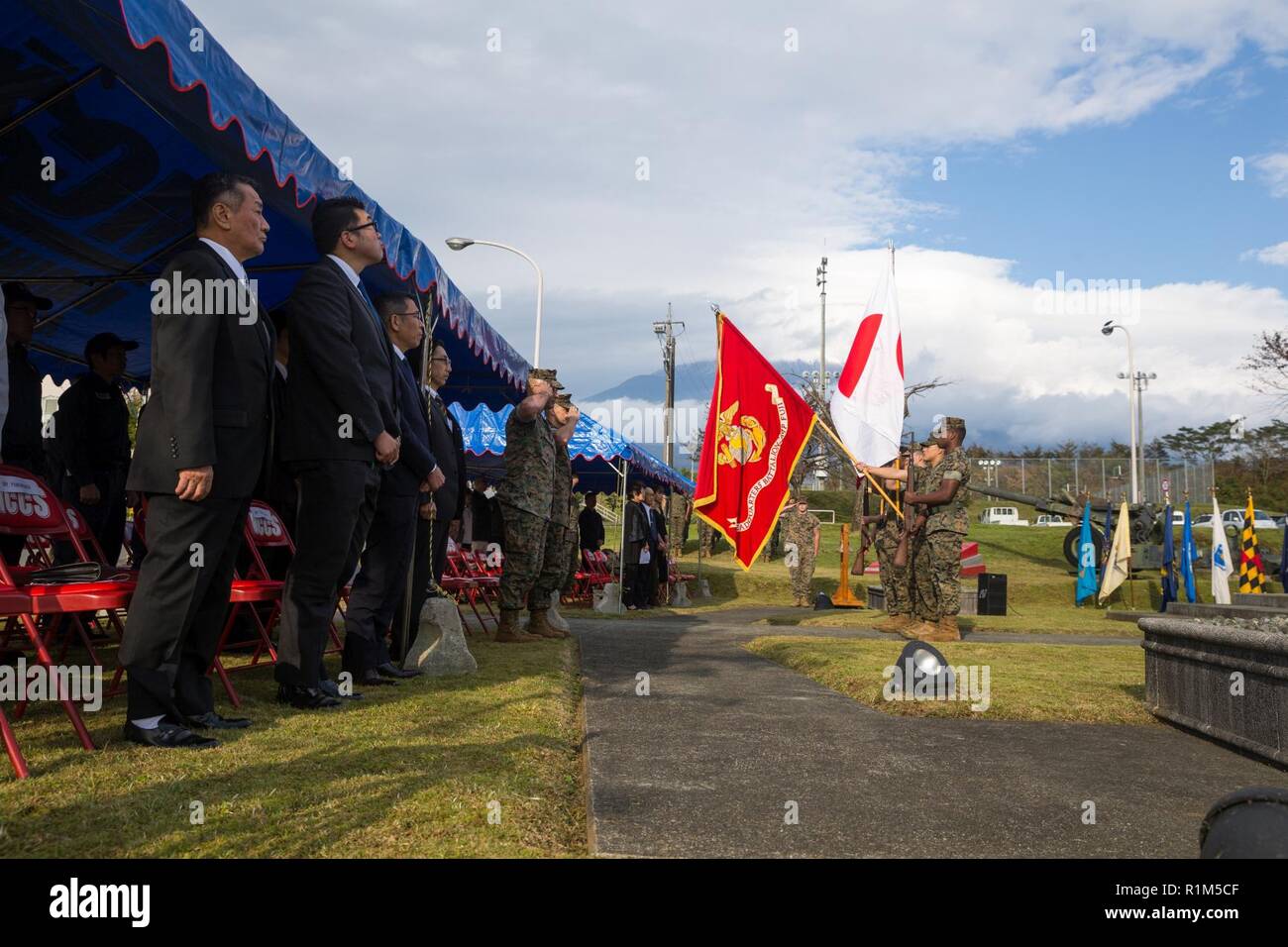 Members of the U.S. military, Japanese officials, and local community ...