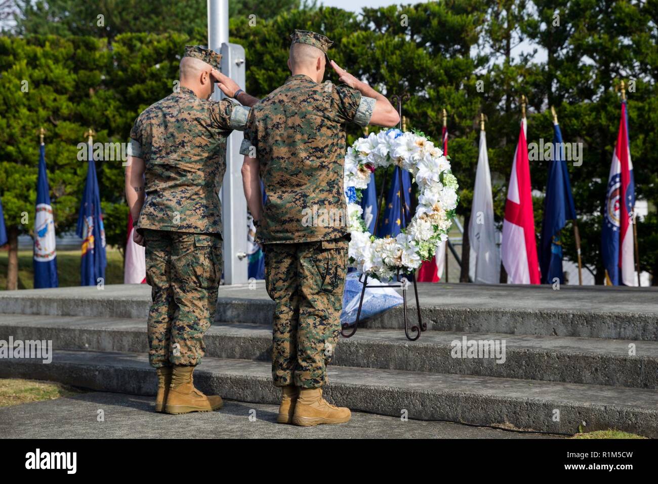 U.S. Marine Corps Col. Michael D. Reilly, right, commanding officer ...