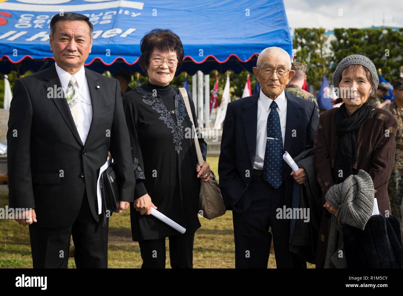 Survivors of the Oct. 19, 1979 Camp Fuji Fire tragedy pose for a photo ...