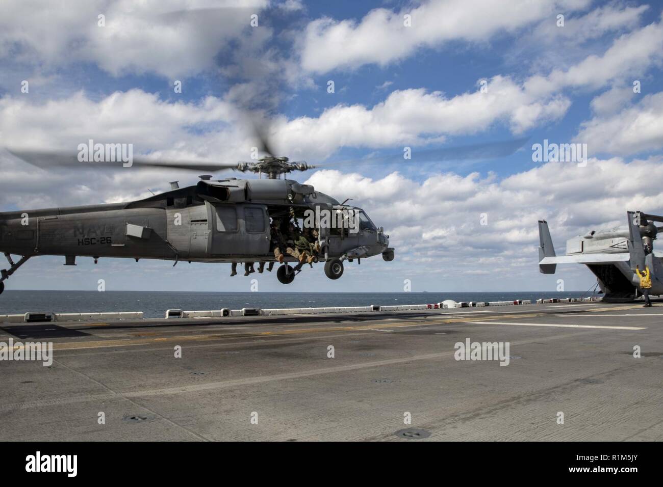 ATLANTIC OCEAN (Oct. 18, 2018) A MH-60S Sea Hawk carrying Marines ...