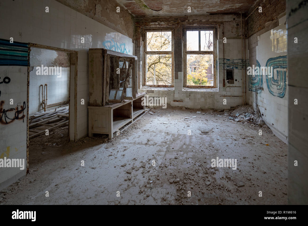 An old room in a dilapidated sanatorium. Indise old cabinets, furniture ...