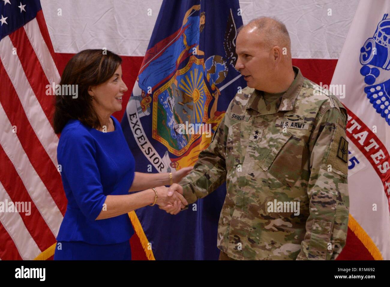 New York Army National Guard Major General Ray Shields is congratulated ...
