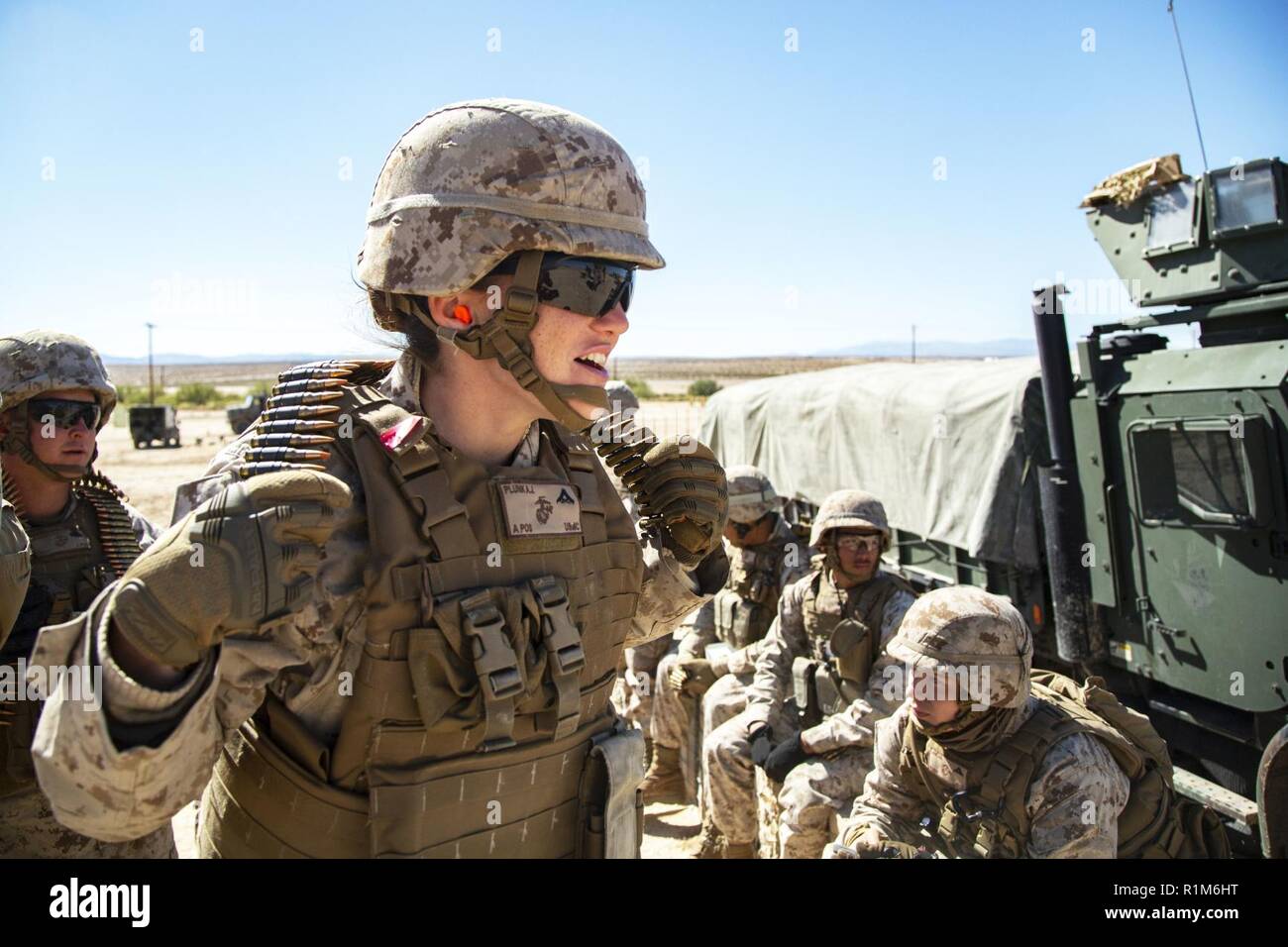 Lance Cpl. Alyssa Plunk carries 7.62 millimeter light machine gun ...
