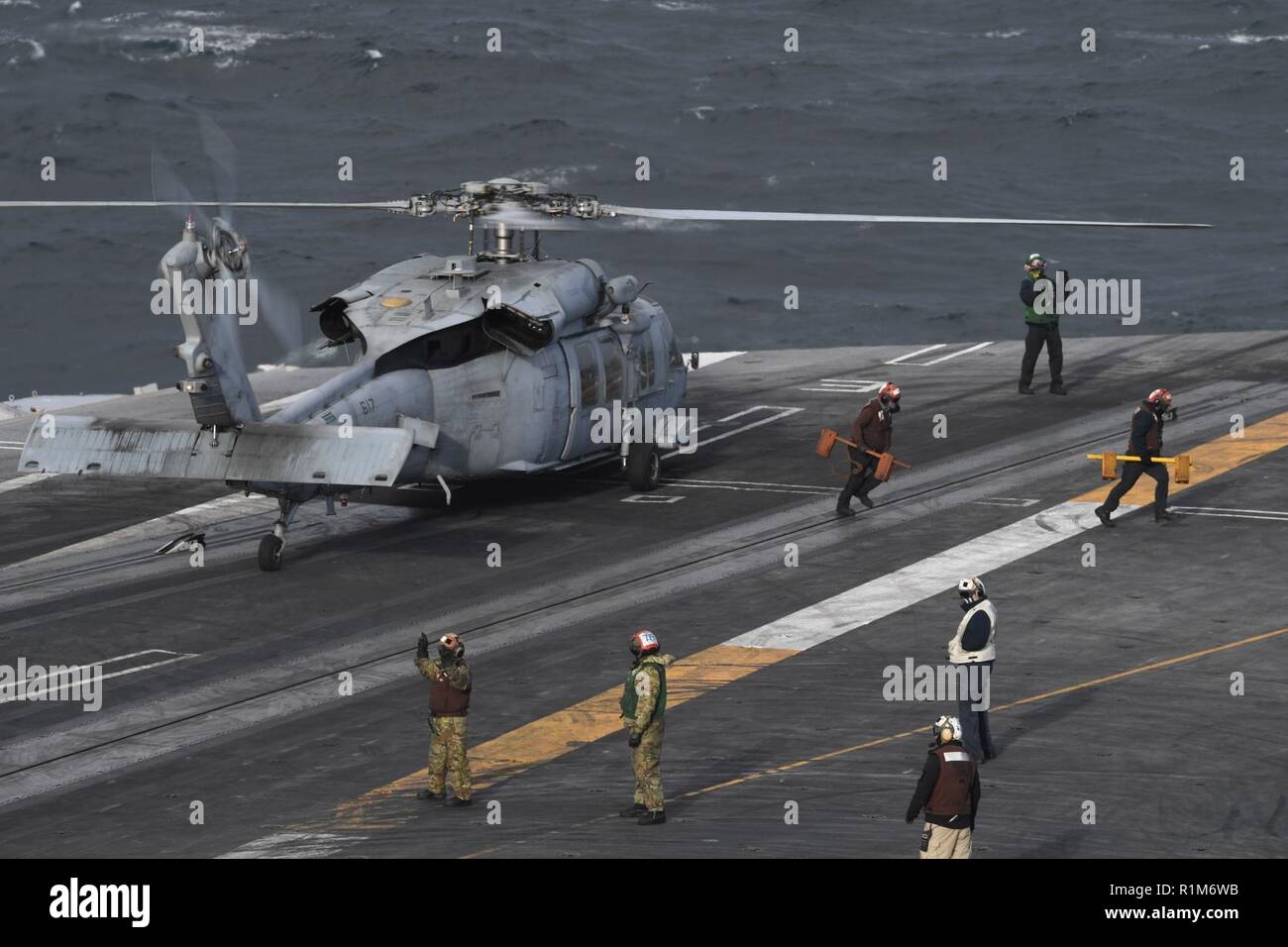 NORWEGIAN SEA (Oct. 18, 2018) An MH-60R Seahawk helicopter, assigned to ...