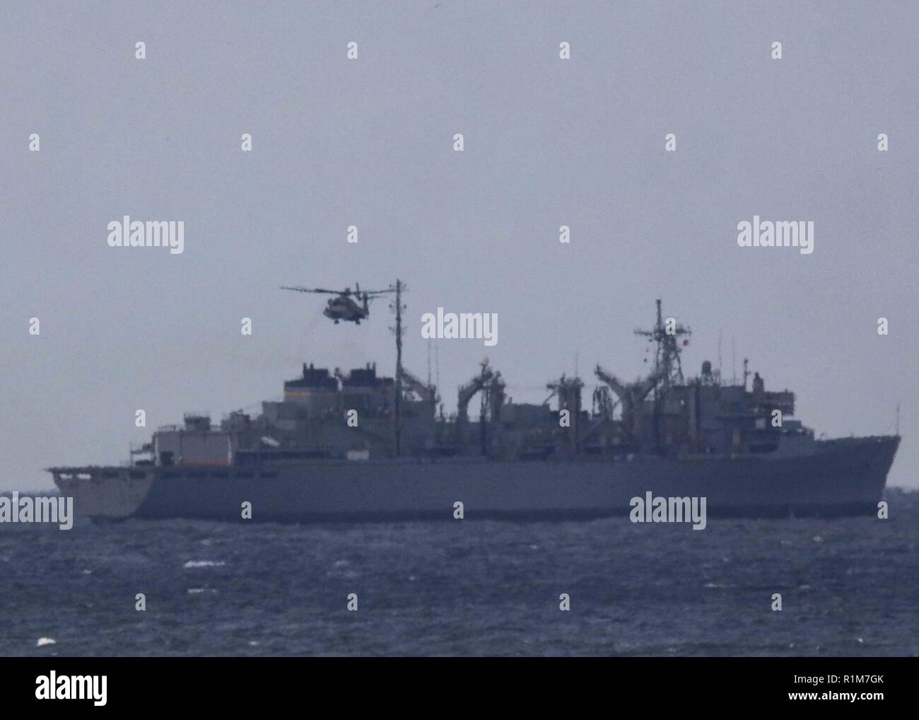 ATLANTIC OCEAN (Oct. 18, 2018) A MH-60S Sea Hawk helicopter carries the ...