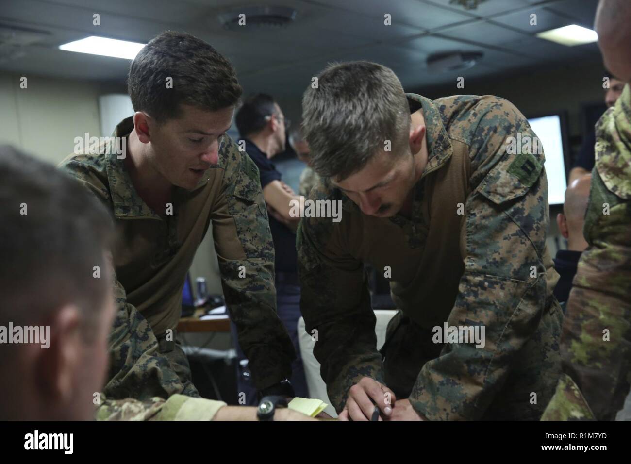 SARDINIA, ITALY (Oct. 11, 2018) U.S. Marine Capt. Michael Falvey, left ...