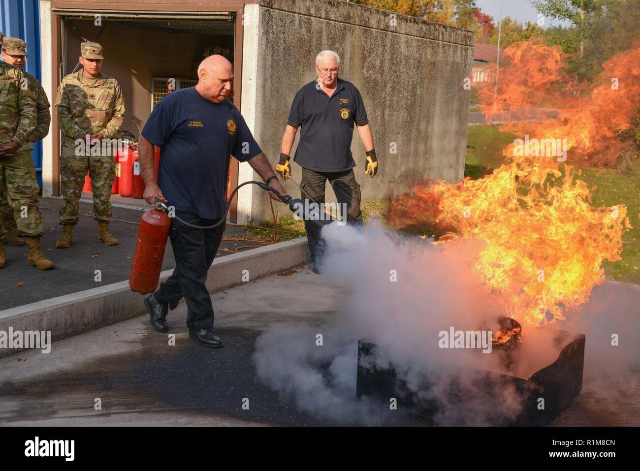 An instructor with the Rose Barracks Fire Department demonstrates to U ...