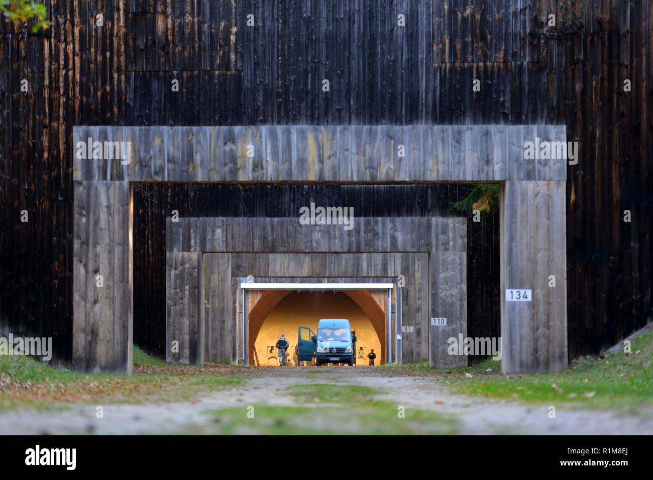 U.S. Soldiers assigned to the 554th Military Police Company set up for ...