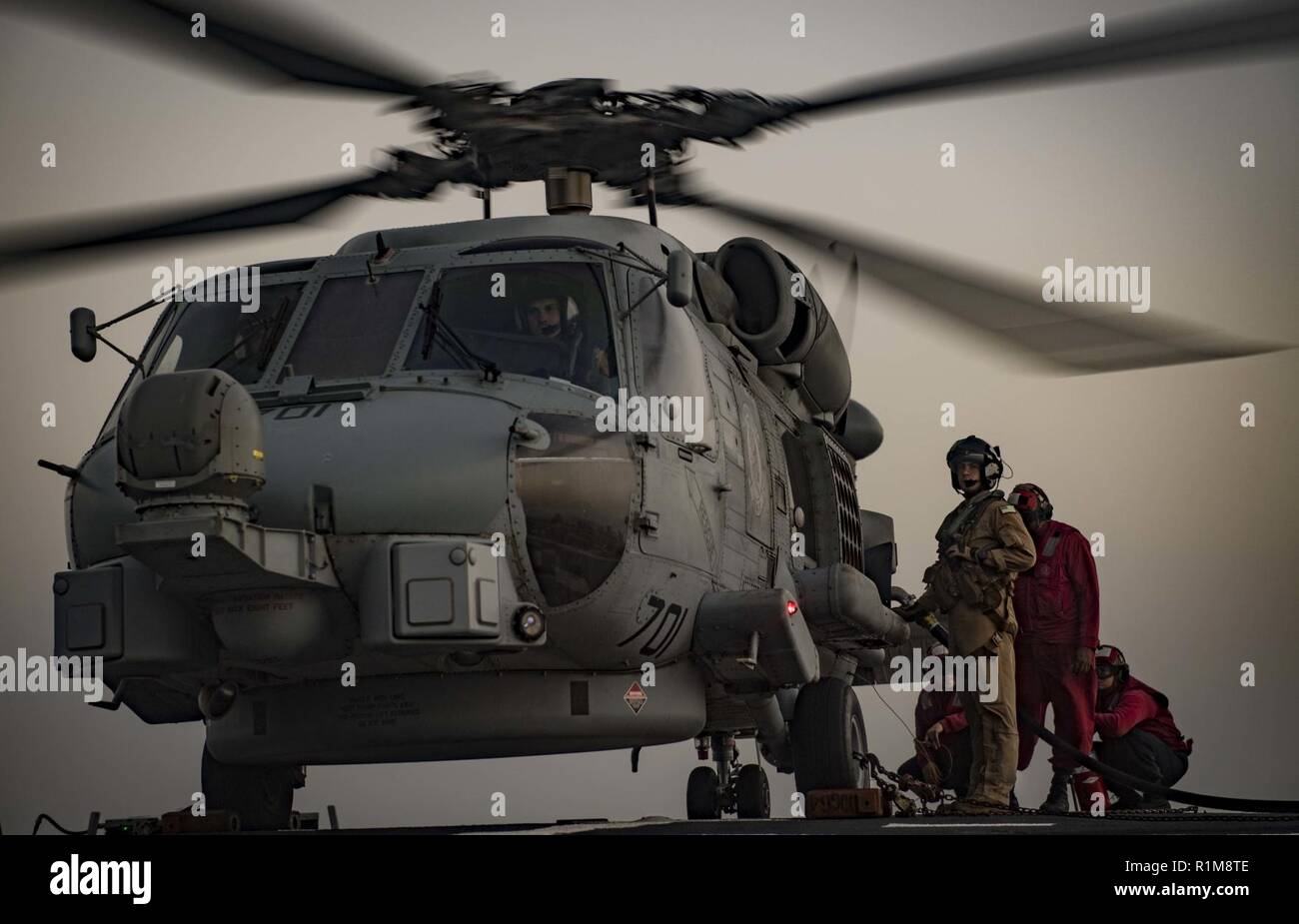 MEDITERRANEAN SEA (Oct. 20, 2018) Sailors refuel an MH-60R Seahawk ...