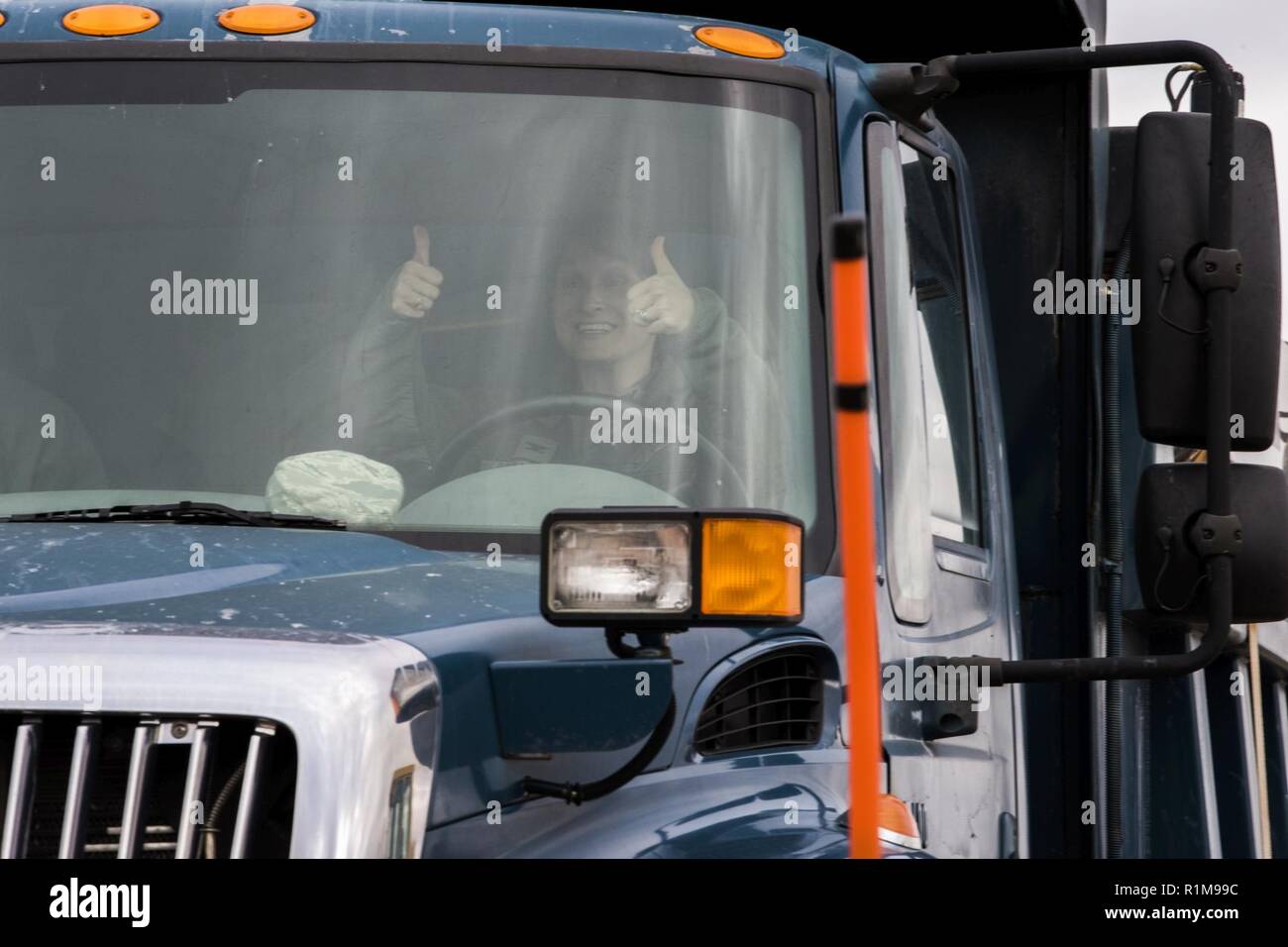 Col. Jennifer Grant, 50th Space Wing commander, gives two thumbs up to ...