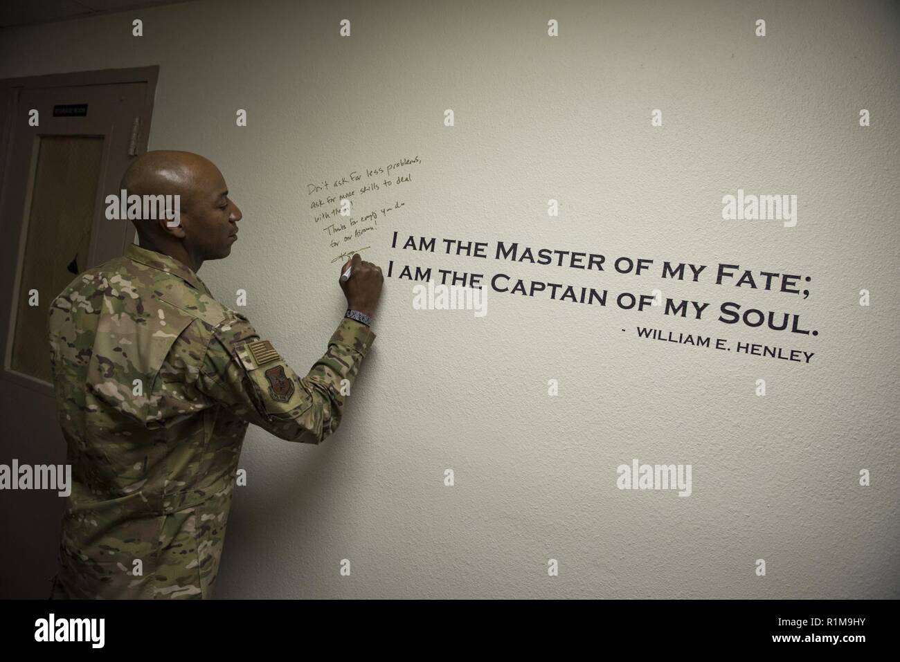Chief Master Sgt. of the Air Force Kaleth O. Wright signs an excerpt ...