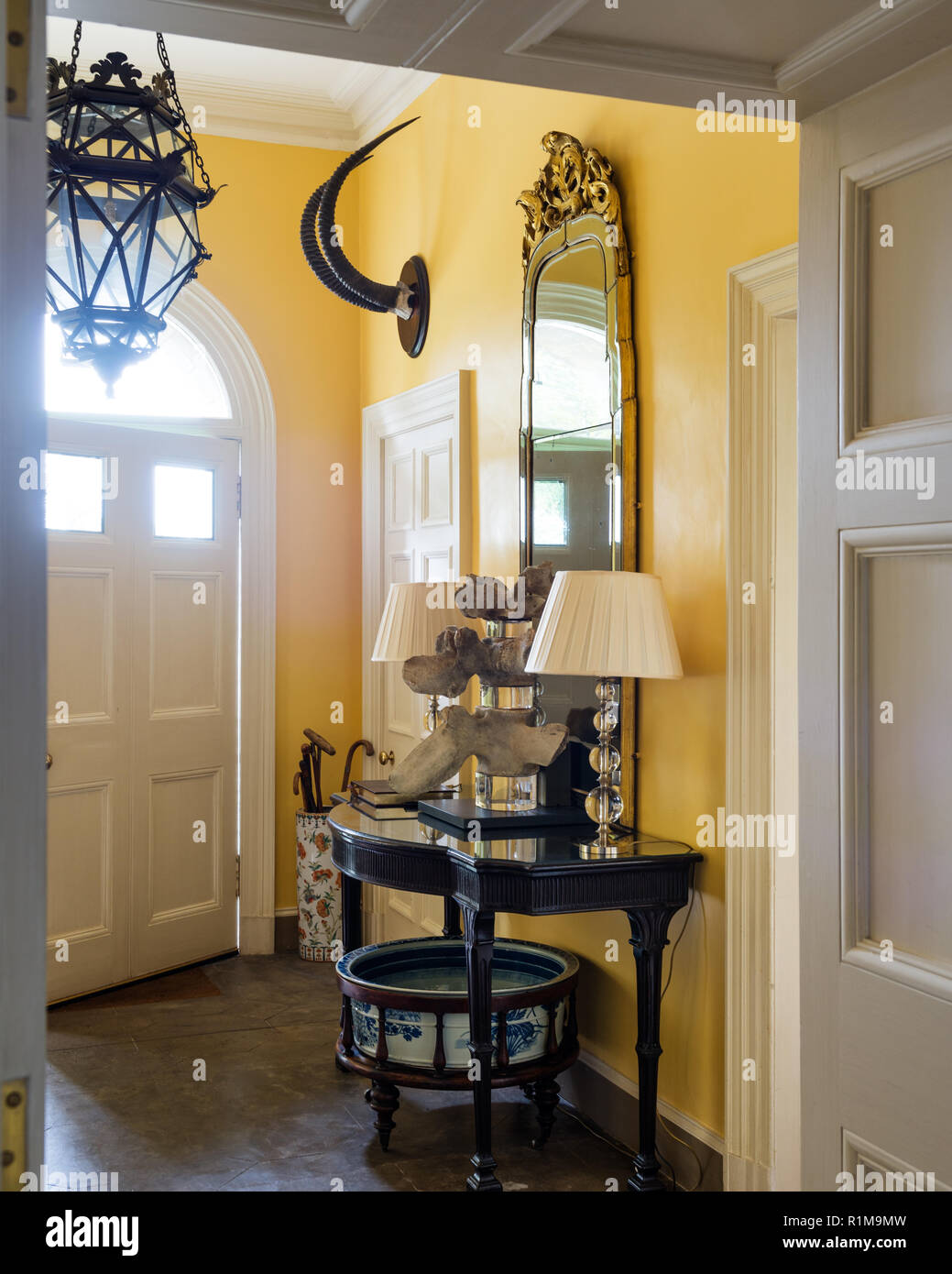 Yellow entrance hall Stock Photo - Alamy