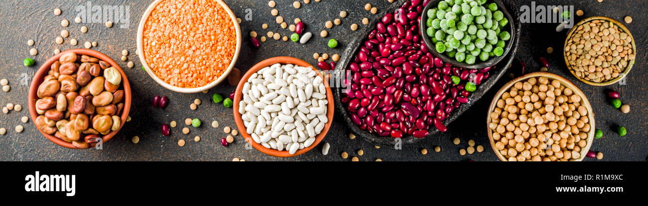 Various assortment of legumes - beans, soy beans, chickpeas, lentils ...