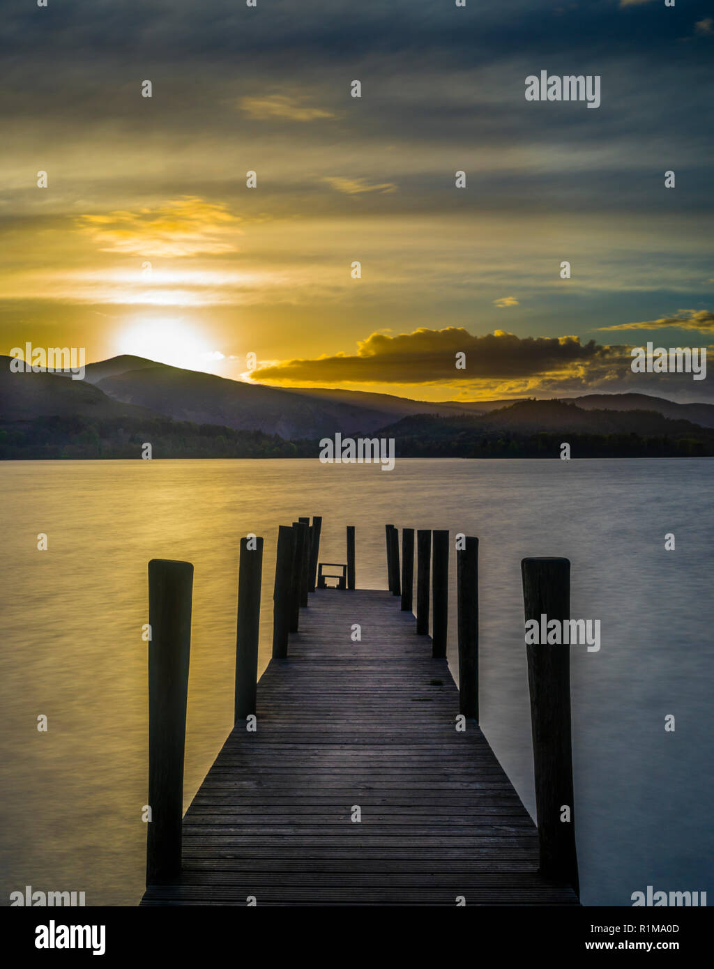 Sunset at the boat landing, Derwentwater, Lake District National Park ...
