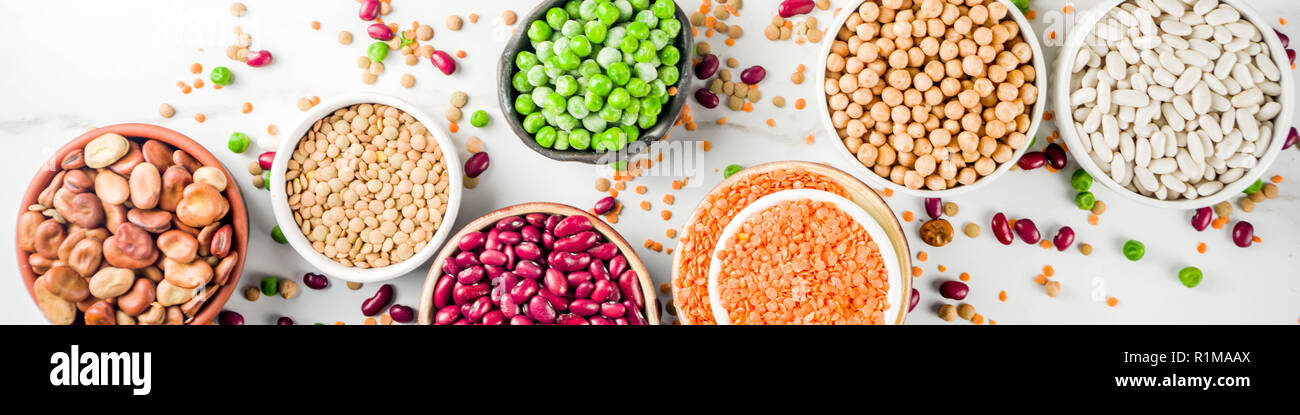 Various assortment of legumes - beans, soy beans, chickpeas, lentils ...
