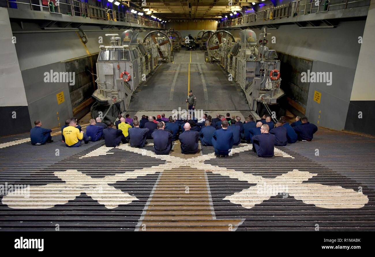 EAST CHINA SEA (Oct. 23, 2018) Capt. Colby Howard, commanding officer ...