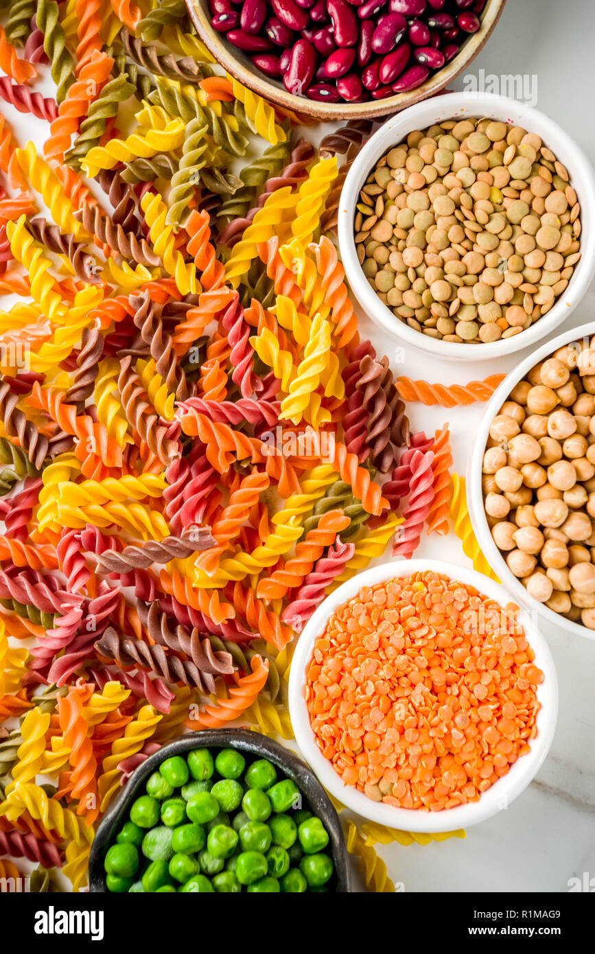 Trend healthy food, vegan diet concept. Multi colored legume pasta with ...