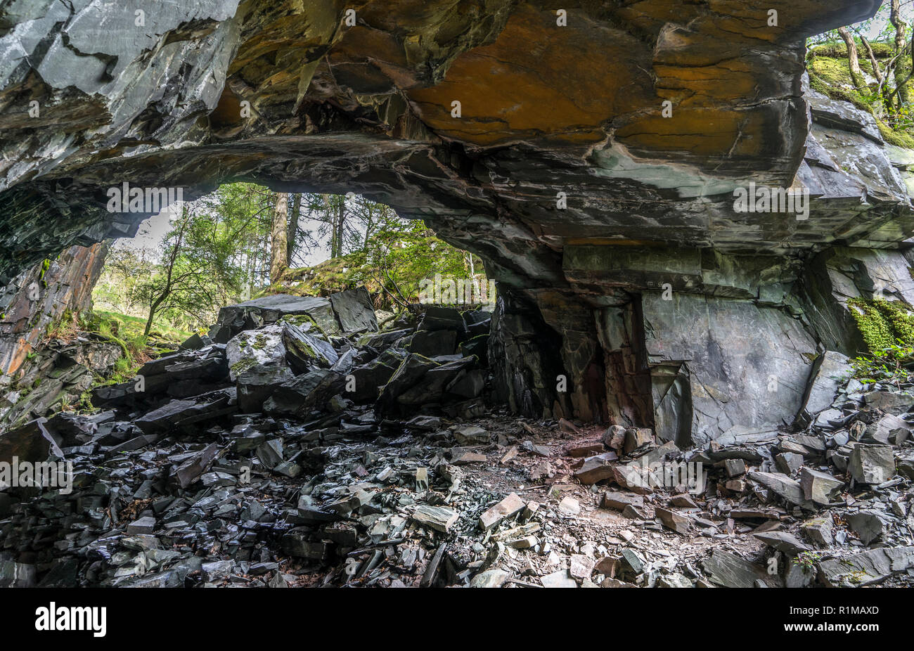 Collapsing arch in an abandoned slate mine on The Cumbria Way footpath ...