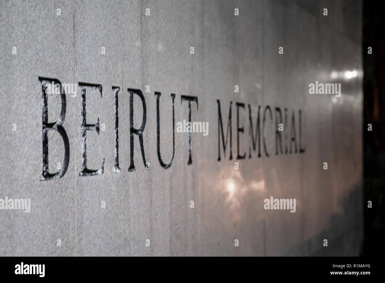 Service members, veterans and families attend a candlelight vigil ...