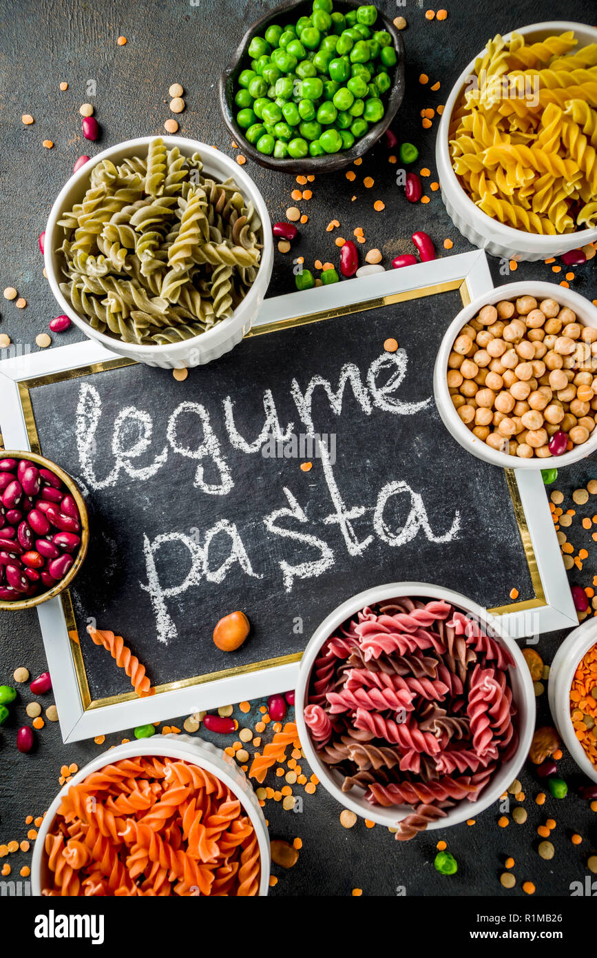 Trend healthy food, vegan diet concept. Multi colored legume pasta with ...