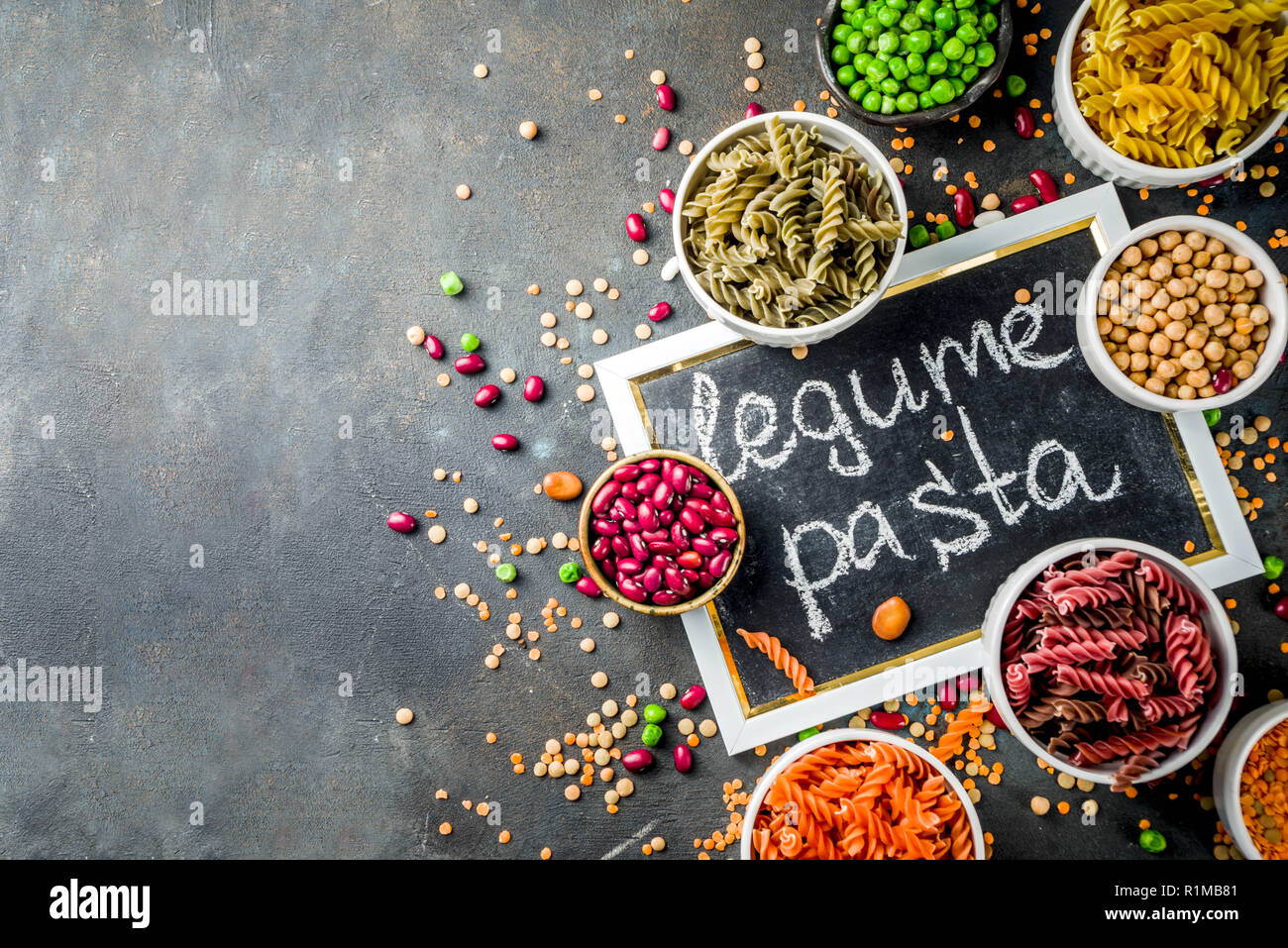Trend healthy food, vegan diet concept. Multi colored legume pasta with ...