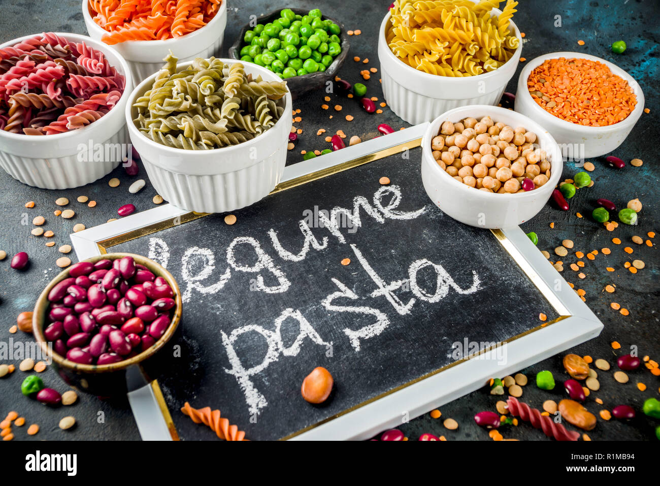 Trend healthy food, vegan diet concept. Multi colored legume pasta with ...