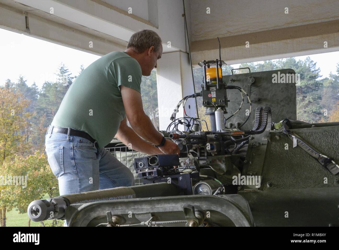A Department of the Army civilian installs new multiple intergrated ...