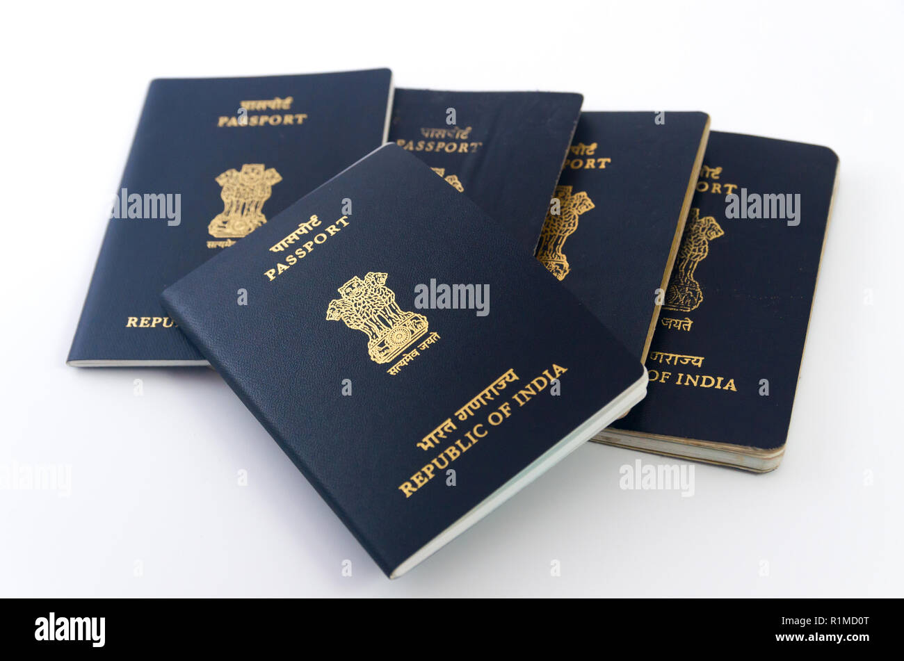 Multiple Indian Passports with white background Stock Photo - Alamy