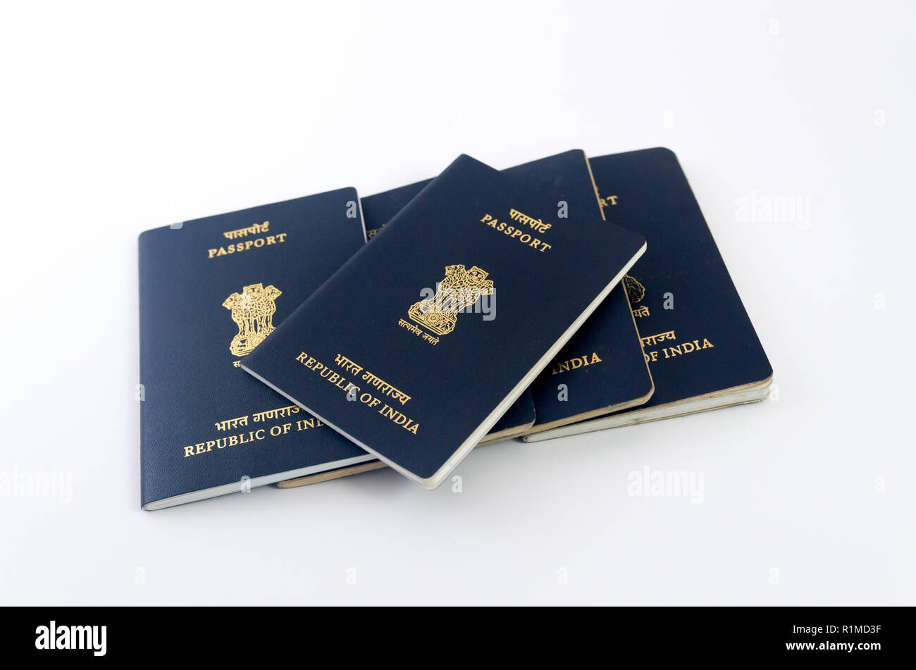 Multiple Indian Passports with white background Stock Photo - Alamy