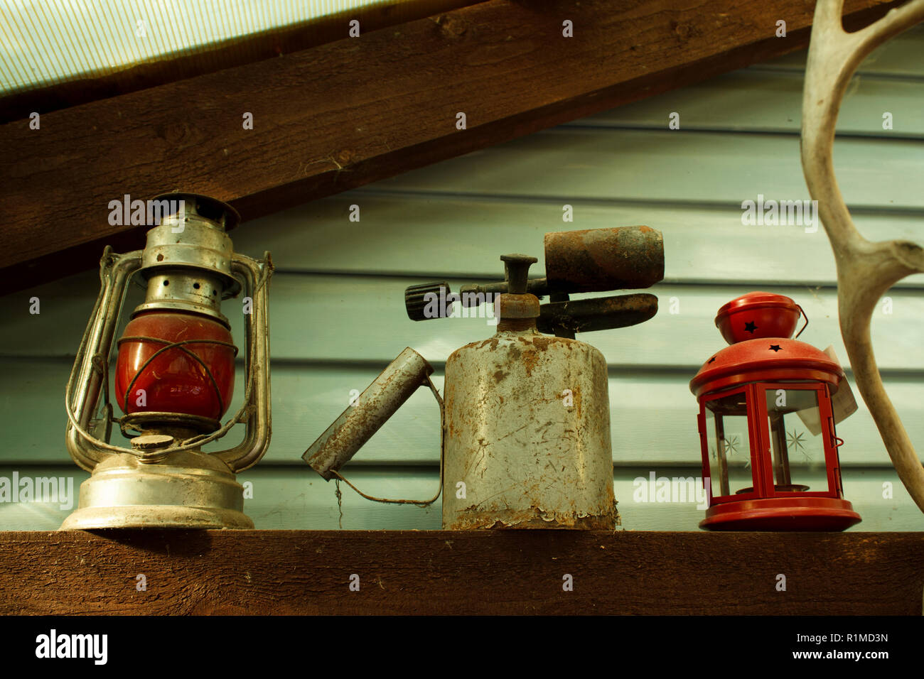 old red Soviet kerosene lamp, which was hung on the last carriage of a ...