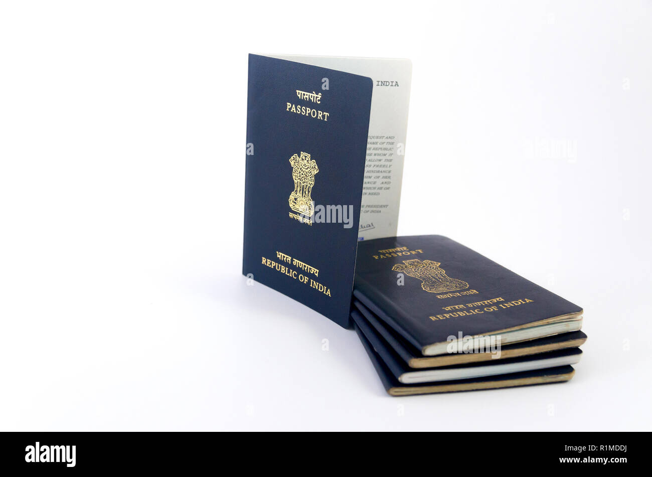 Multiple Indian Passports with white background Stock Photo - Alamy