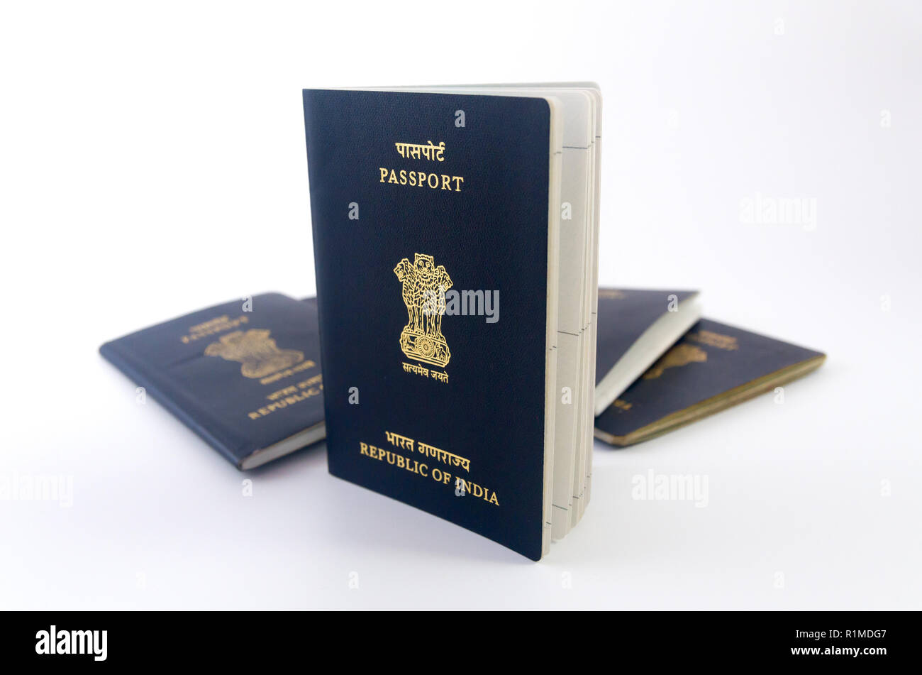 Multiple Indian Passports with white background Stock Photo - Alamy