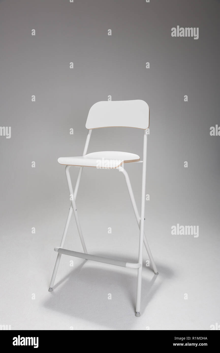 White high chair hi-res stock photography and images - Alamy