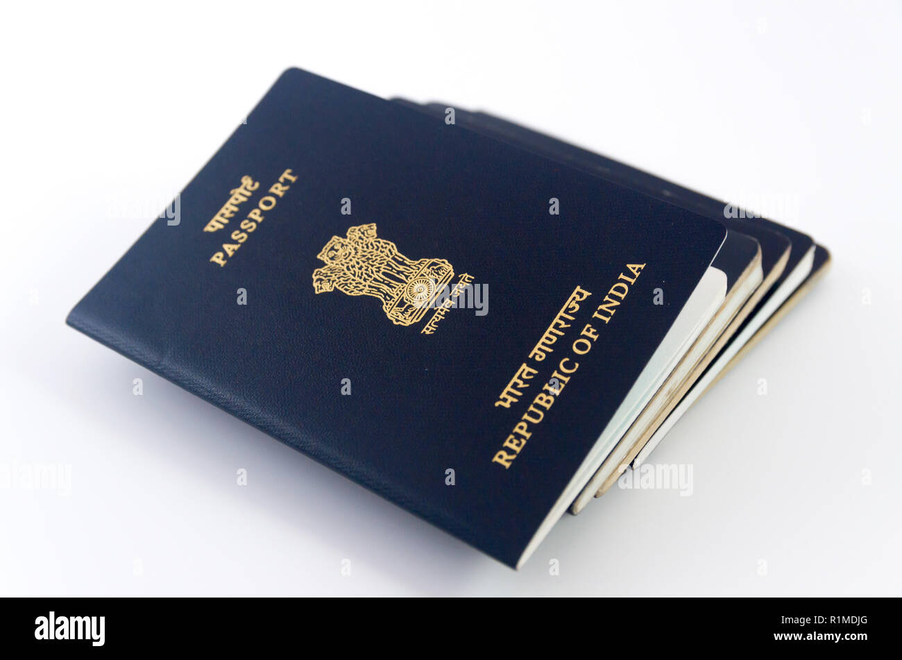 Multiple Indian Passports with white background Stock Photo - Alamy