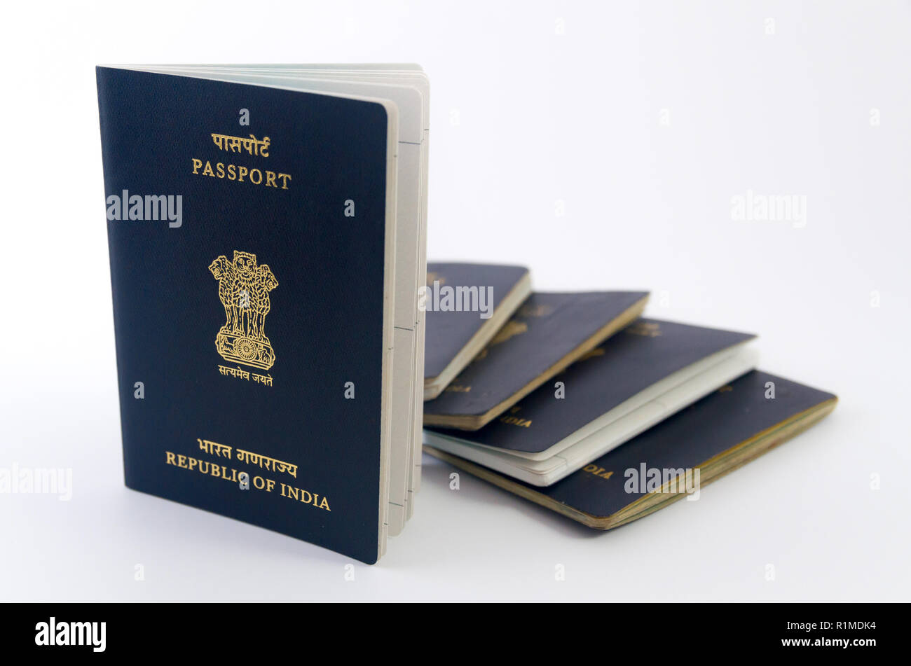 Multiple Indian Passports with white background Stock Photo - Alamy