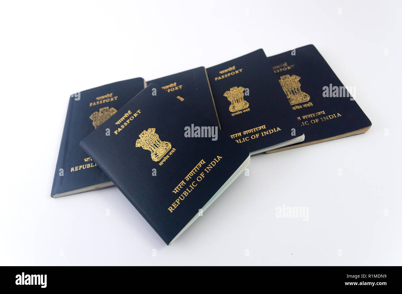 Multiple Indian Passports with white background Stock Photo - Alamy
