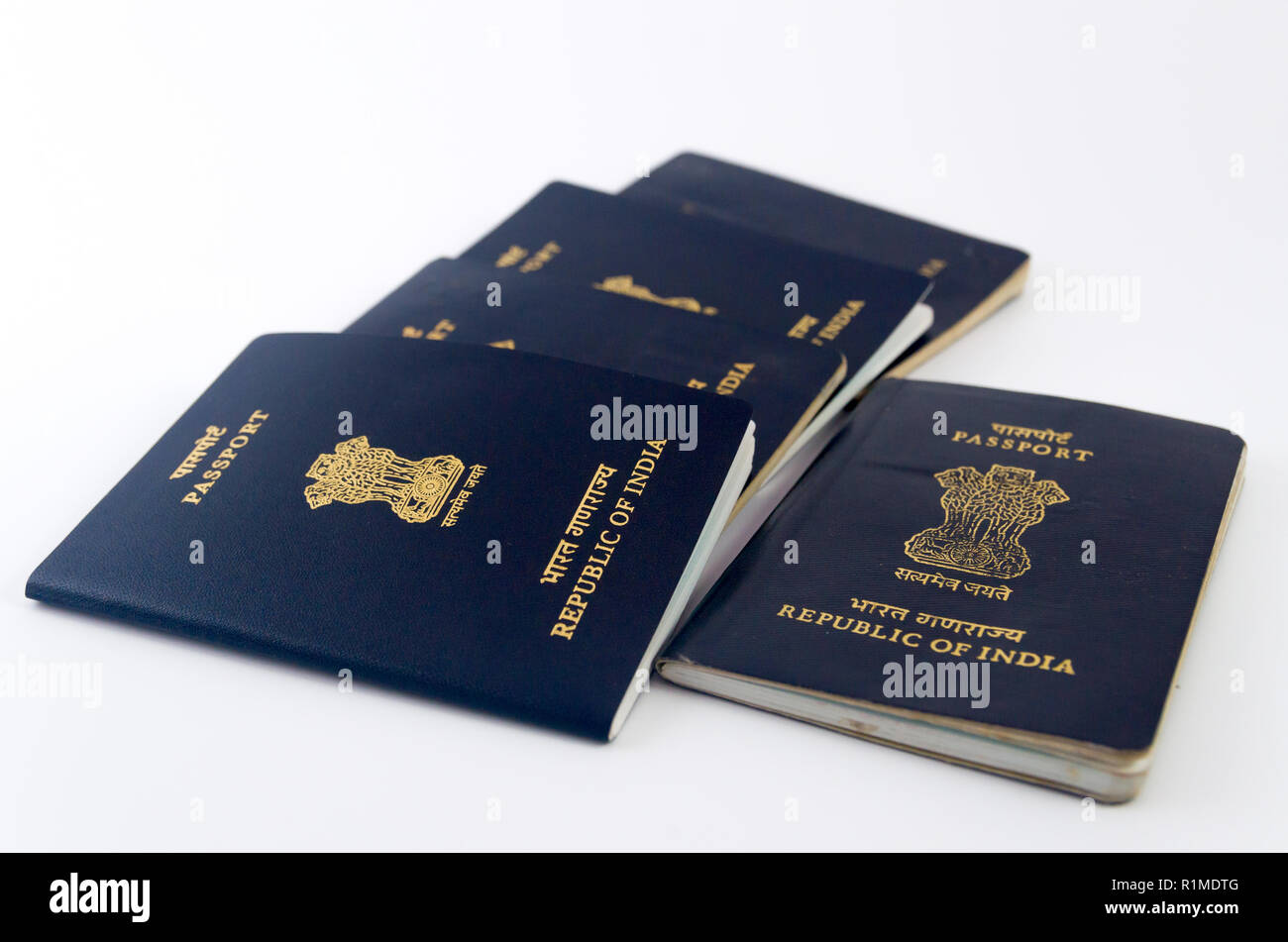 Multiple Indian Passports with white background Stock Photo - Alamy