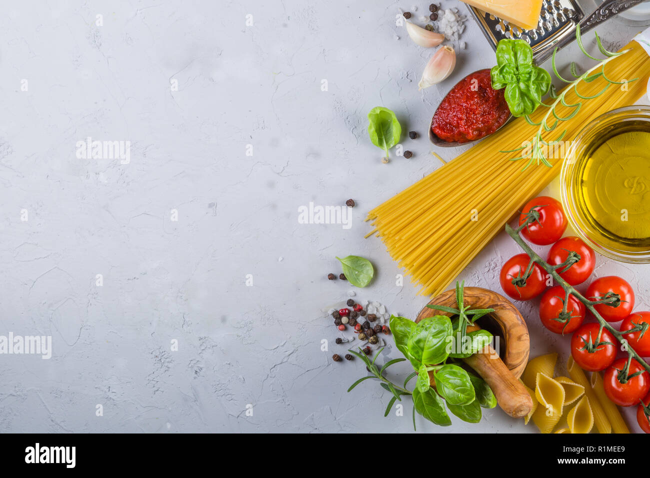 Raw pasta ingredients background Stock Photo - Alamy